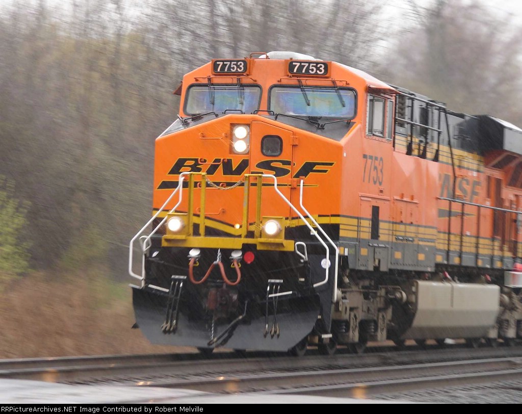 BNSF 7753 eastbound in a heavy rain near MP 379